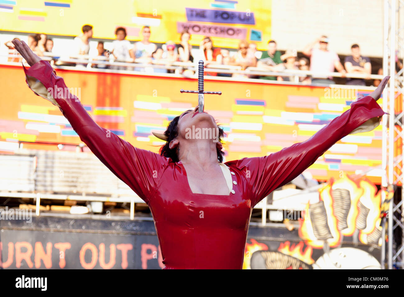 Sword swallowing hi-res stock photography and images - Alamy