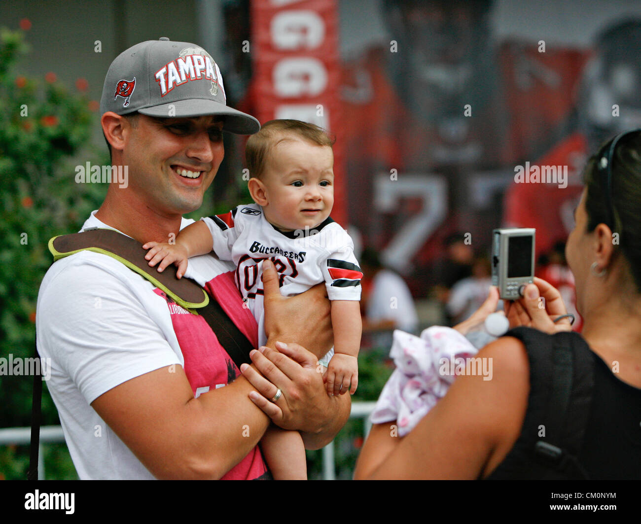 Sept. 9, 2012 - Florida, U.S. - Chris Decker holds his 7-month-old ...