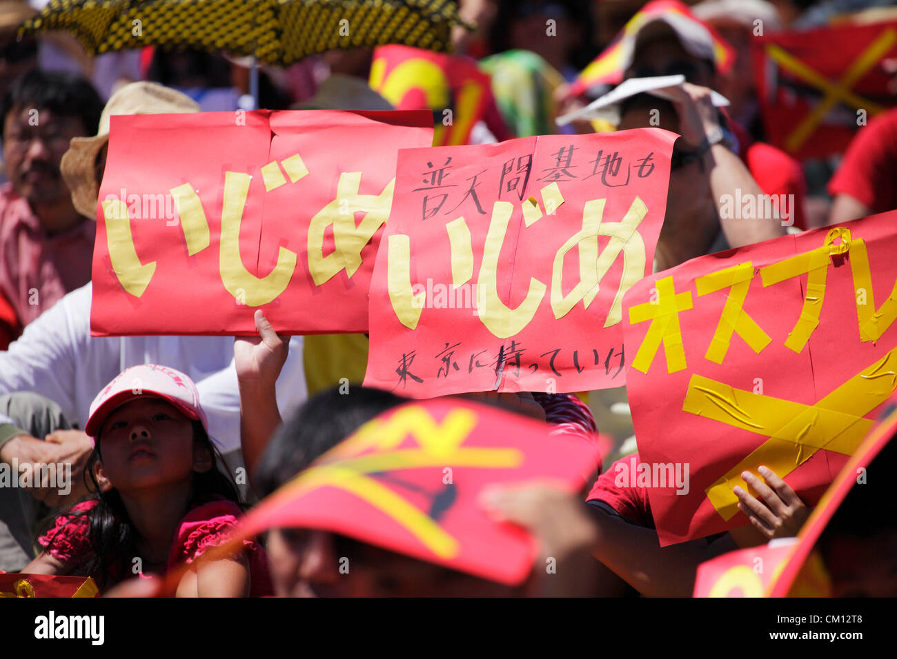 September 9, 2012, Okinawa, Japan - Demonstrators hold placards during ...