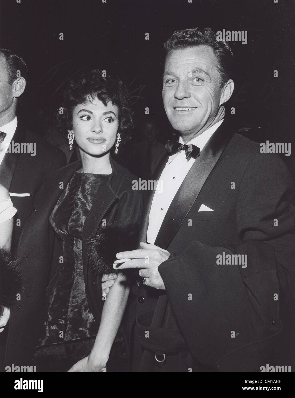 RITA MORENO with Jacques Mapes at the Cinerama Premiere.Supplied by ...