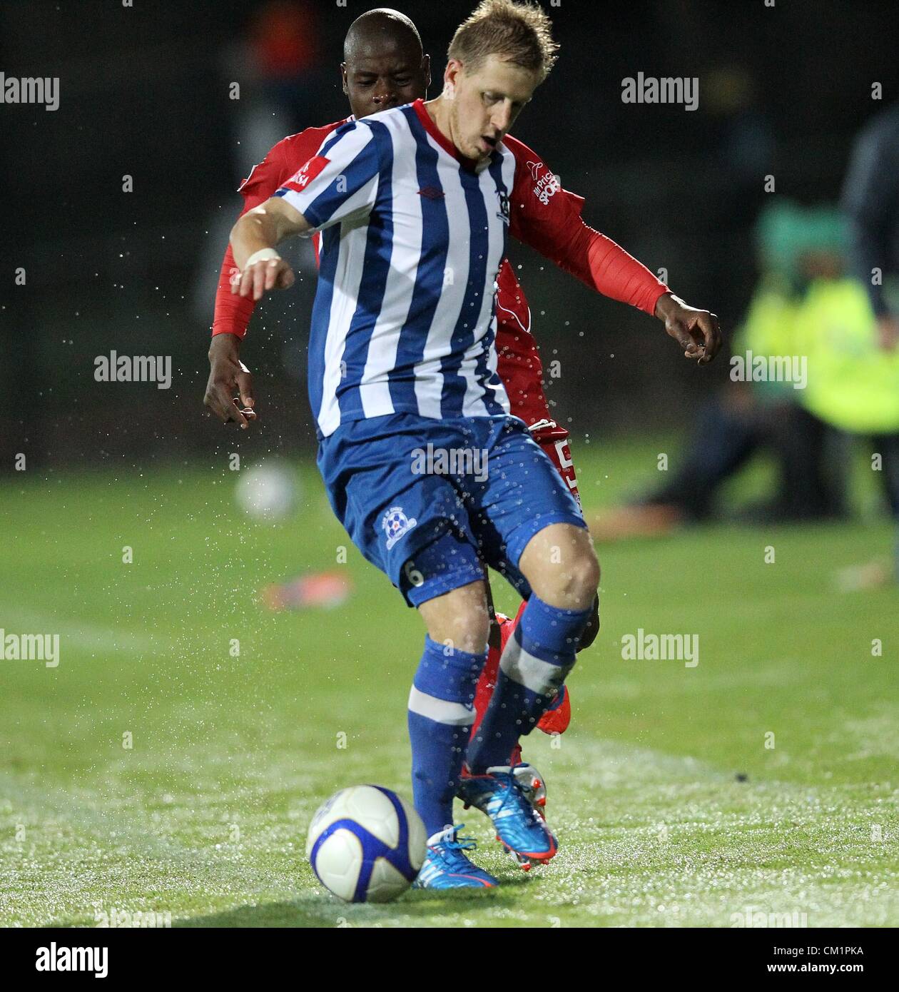 DURBAN, SOUTH AFRICA - SEPTEMBER 14,Michael Morton sheds the ball ...