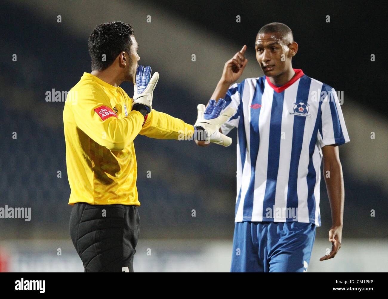 DURBAN, SOUTH AFRICA - SEPTEMBER 14,Shuaib Walters ( l) talks to Mario ...