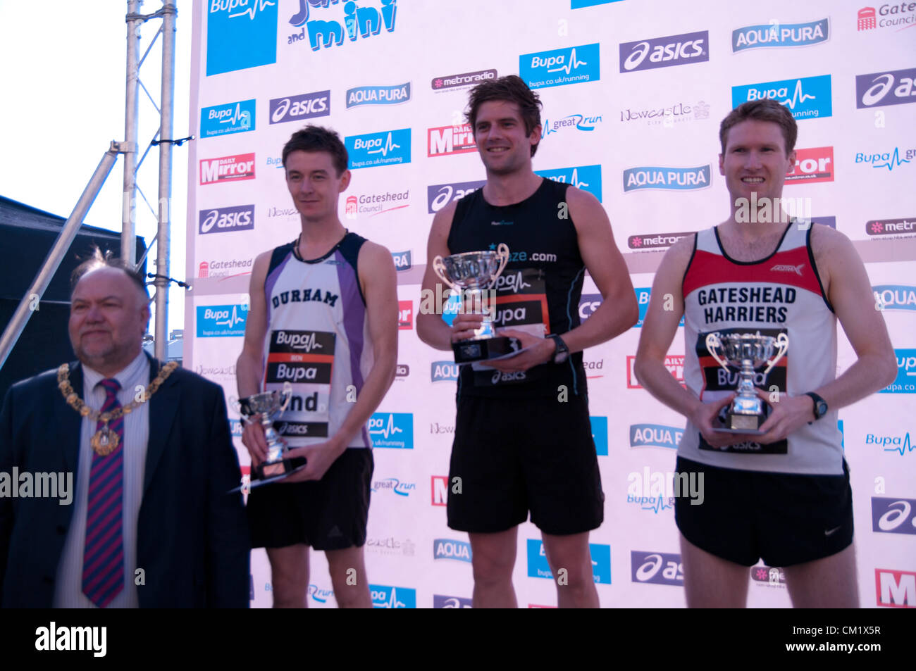 The Mayor of Gateshead, Councillor Malcolm Brain standing with winner ...