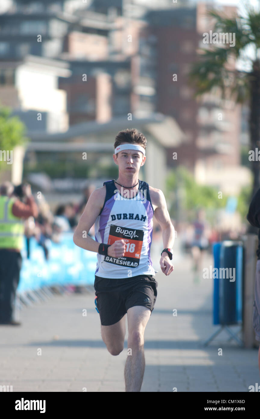 Ben Douglas of Durham University Athletics Club crossing the finish ...