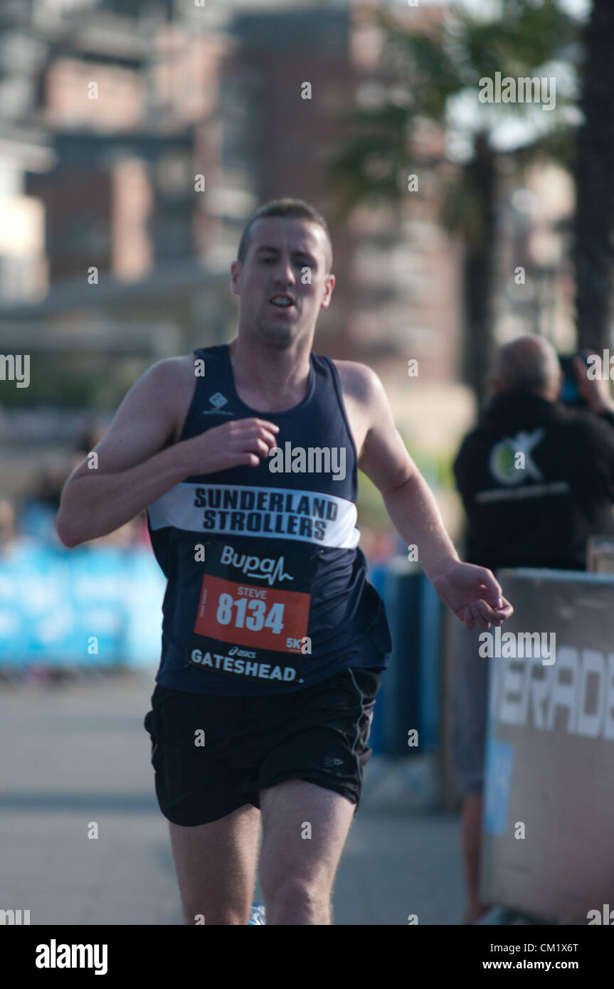 Steve Rankin of Sunderland Strollers crossing the finish line in fourth ...