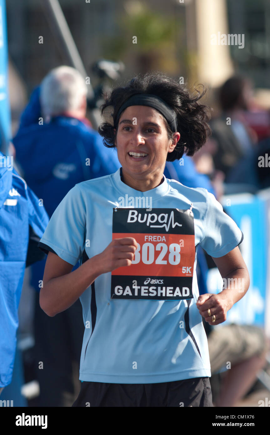 Freda Summerfield crossing the line in second place in the women's race ...