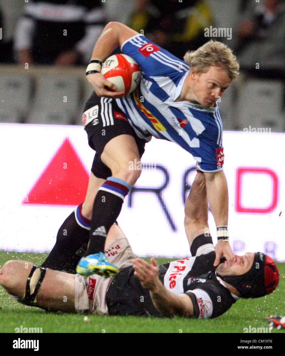 DURBAN, SOUTH AFRICA - SEPTEMBER 15, Joe Pietersen hands off Jacques ...