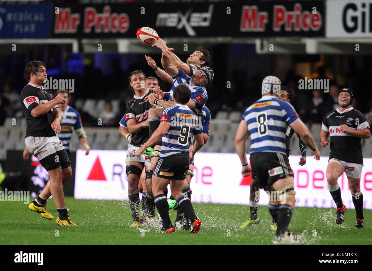 DURBAN, SOUTH AFRICA - SEPTEMBER 15, Keegan Daniel gets a hand to the ...
