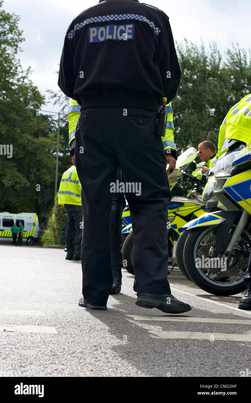 Police Oficers prepare to escort the 2012 Tour Of Britain Cycle Race on ...