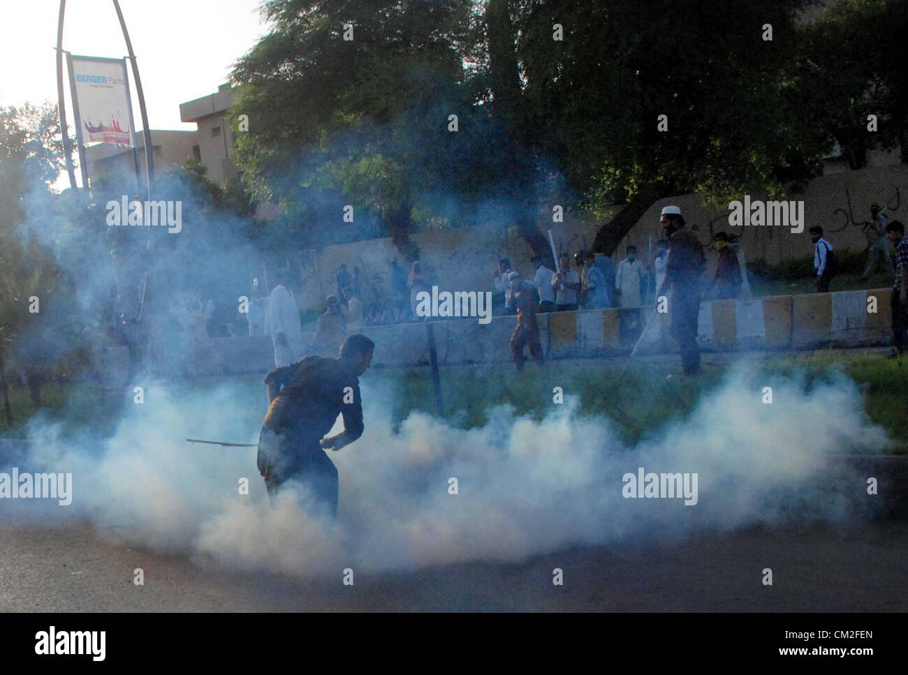 ISLAMABAD. PAKISTAN. 20th September, 2012. Smoke rise from tear gas ...