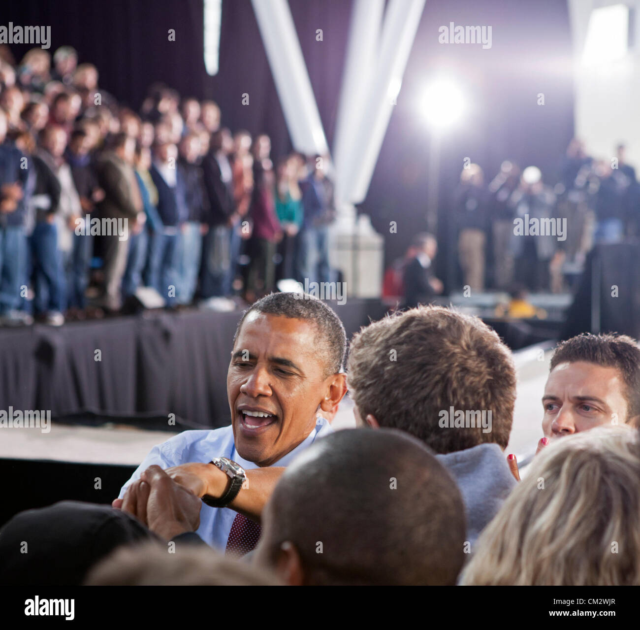 US President Barack Obama shakes hands with supporters after a speech ...