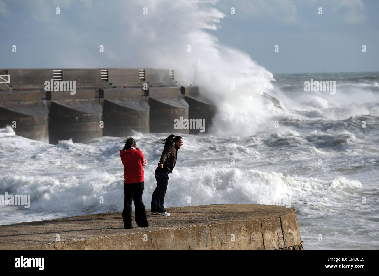 Standing against wind two people hi-res stock photography and images ...