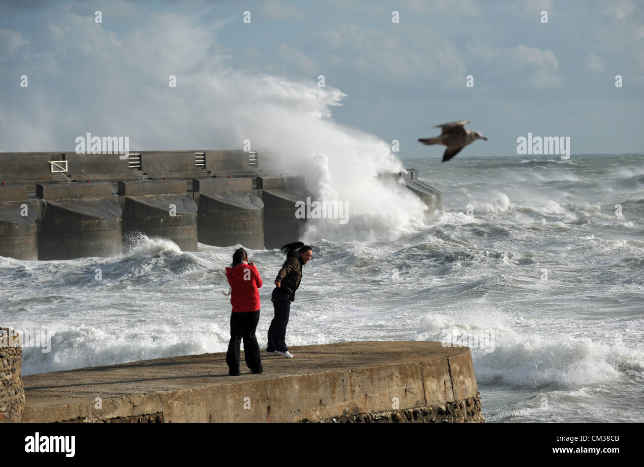 Standing against wind two people hi-res stock photography and images ...