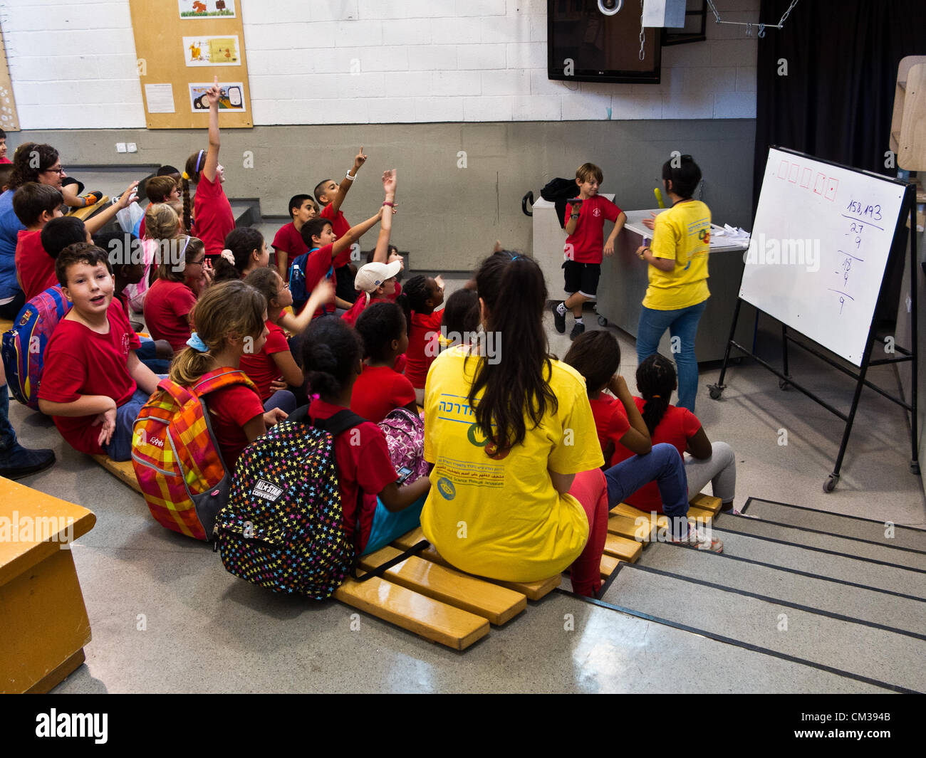 Children receive a lecture on the basics of computers at the Bloomfield ...