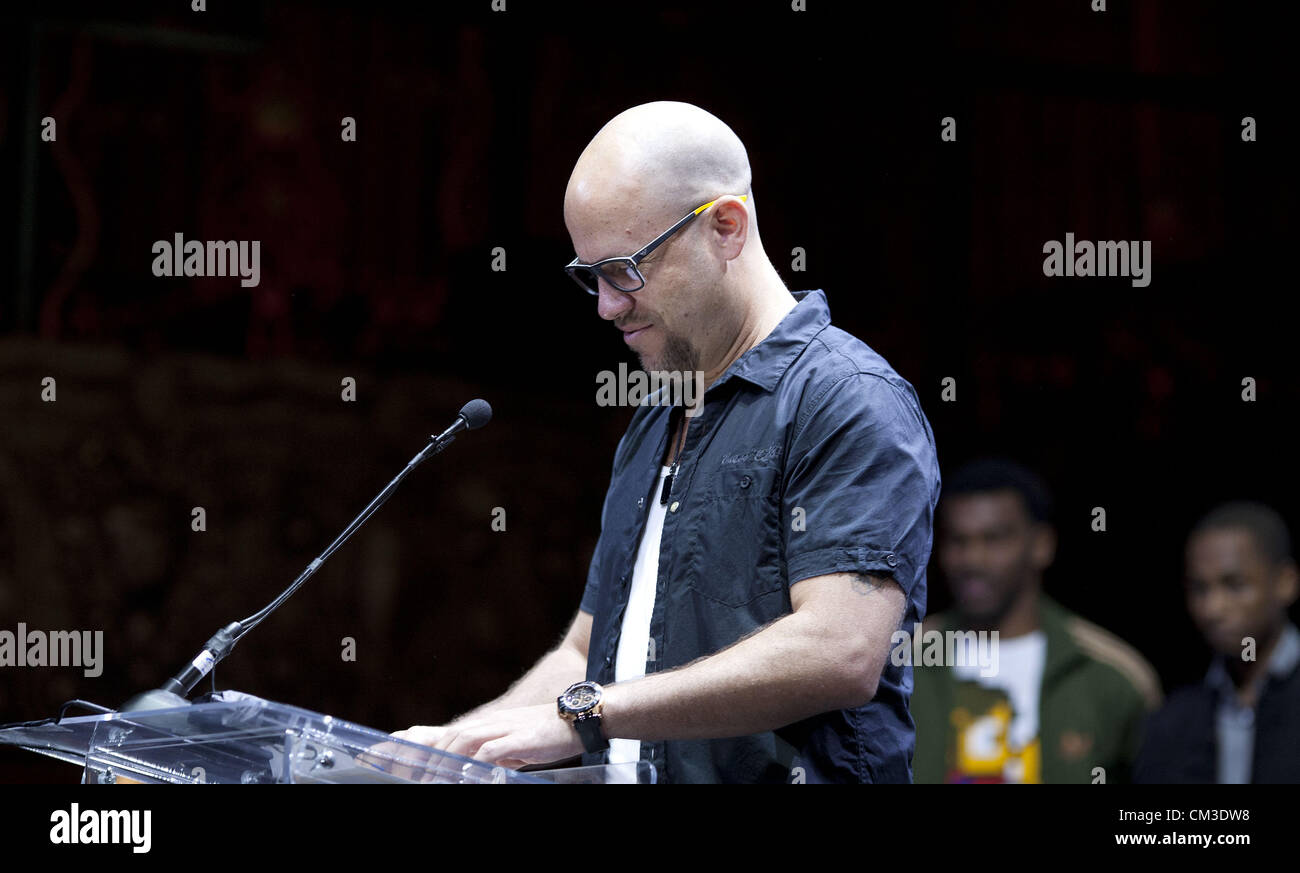 Sept. 25, 2012 - Los Angeles, CALIFORNIA, USA - Singer Gian Marco reads ...
