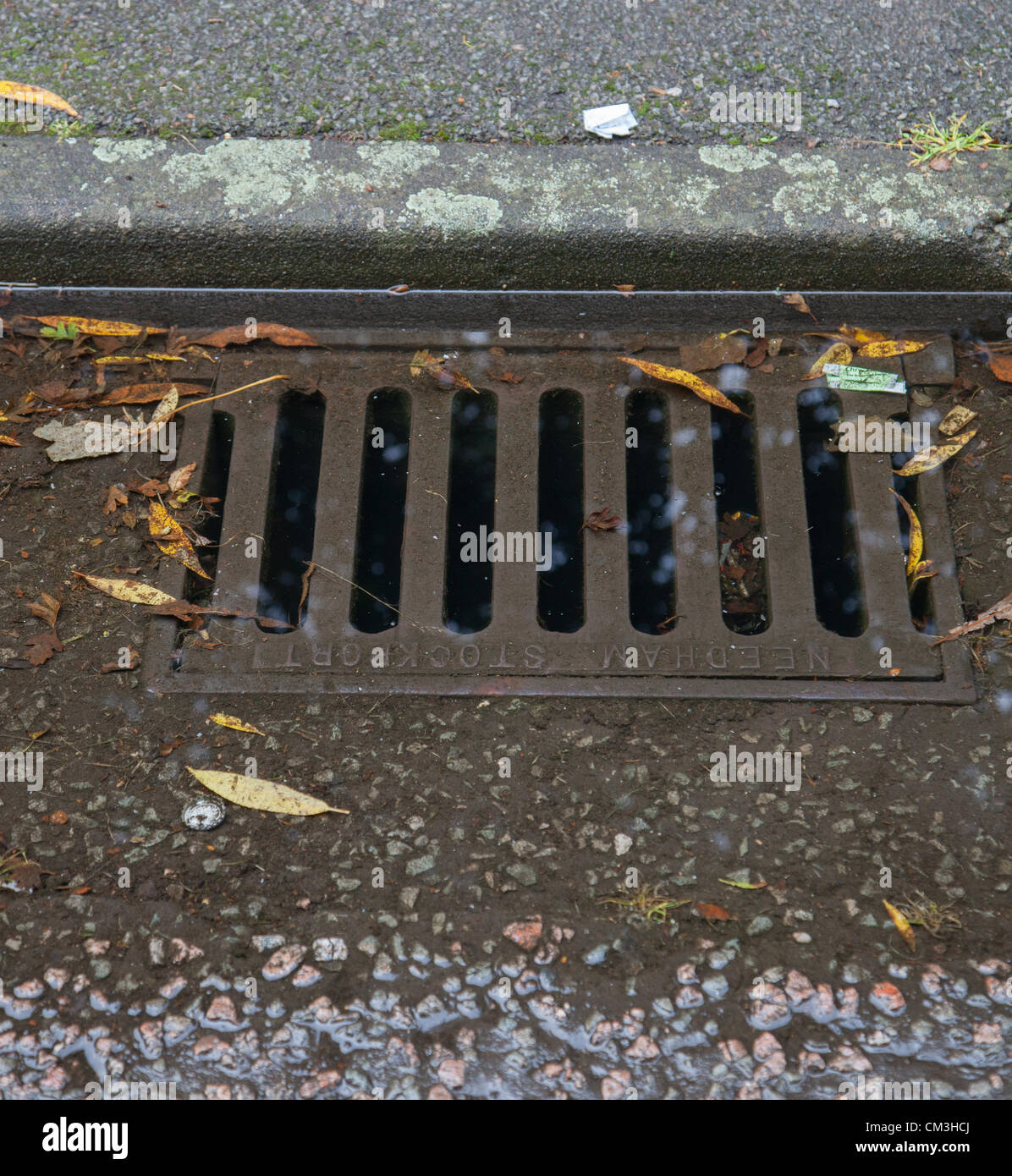 Roadside metal drain cover hi-res stock photography and images - Alamy