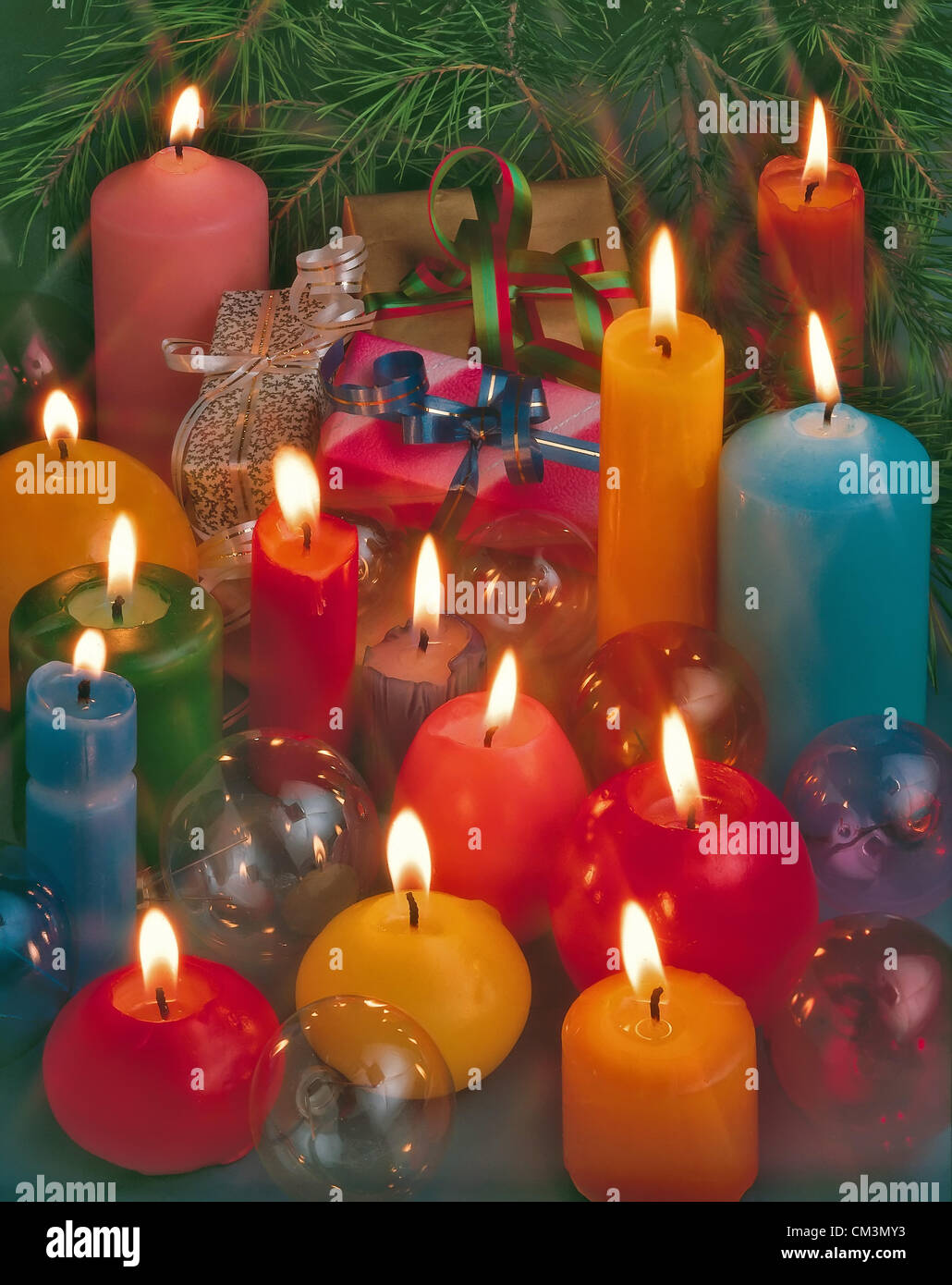 Christmas still-life with a candles and gifts Stock Photo - Alamy