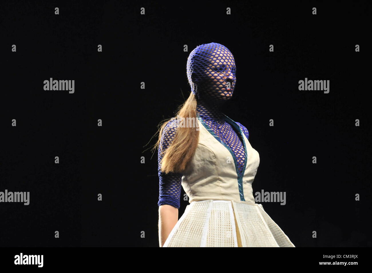 JOHANNESBURG, SOUTH AFRICA - SEPTEMBER 27: A model showcases a design ...