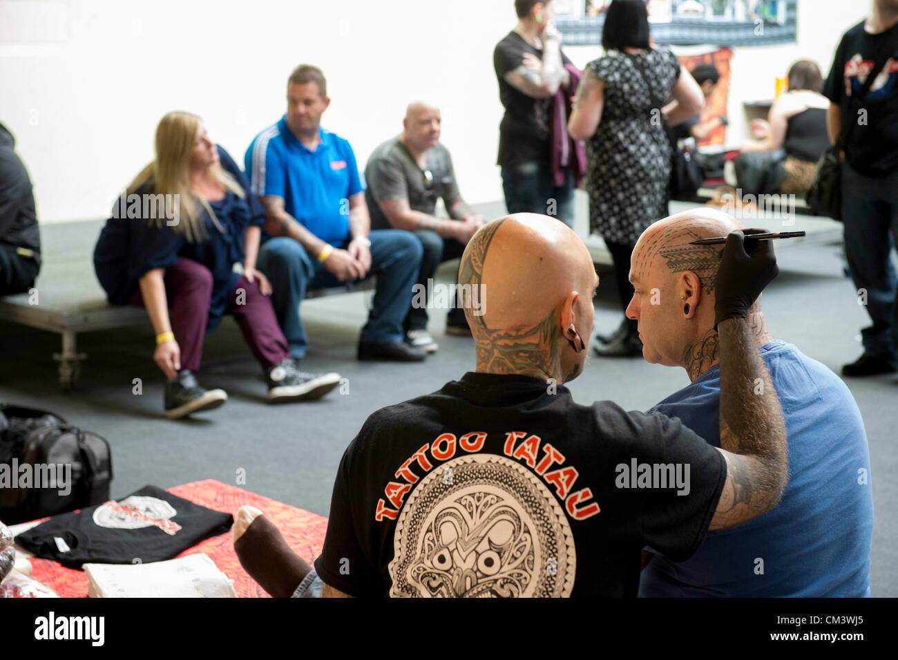 Hand tapping tattoo hi-res stock photography and images - Alamy