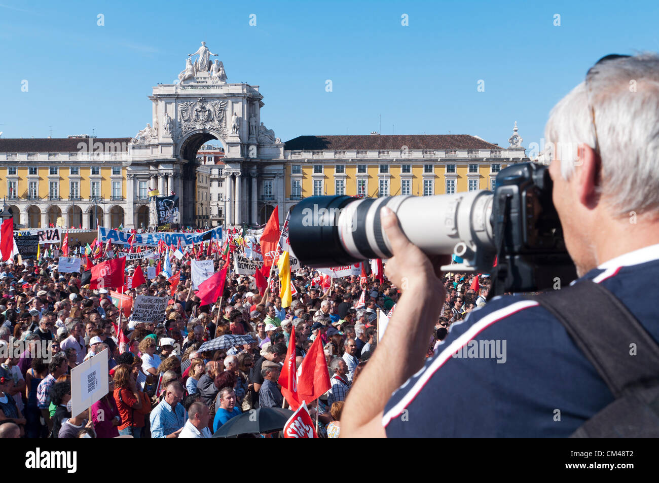 Cameraman / reporter / photographer covering the peaceful protest ...