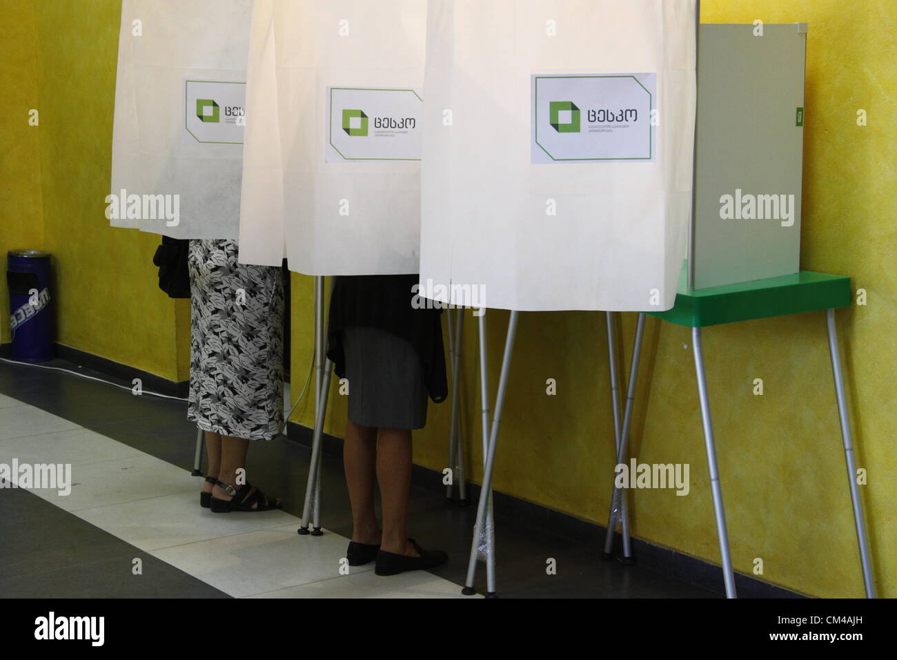 1 October 2012 - Tibilisi, Georgia - Two women, partially hidden, in ...