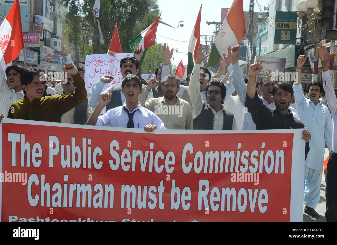 Activists of Pashtoonkhawa Students Organization (PSO) chant slogans ...