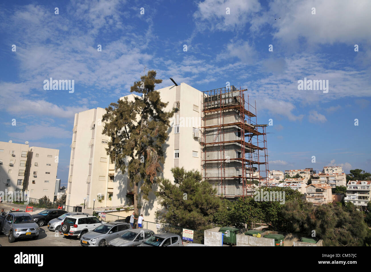 Construction of bomb shelter on a building in the Northern Israeli town ...