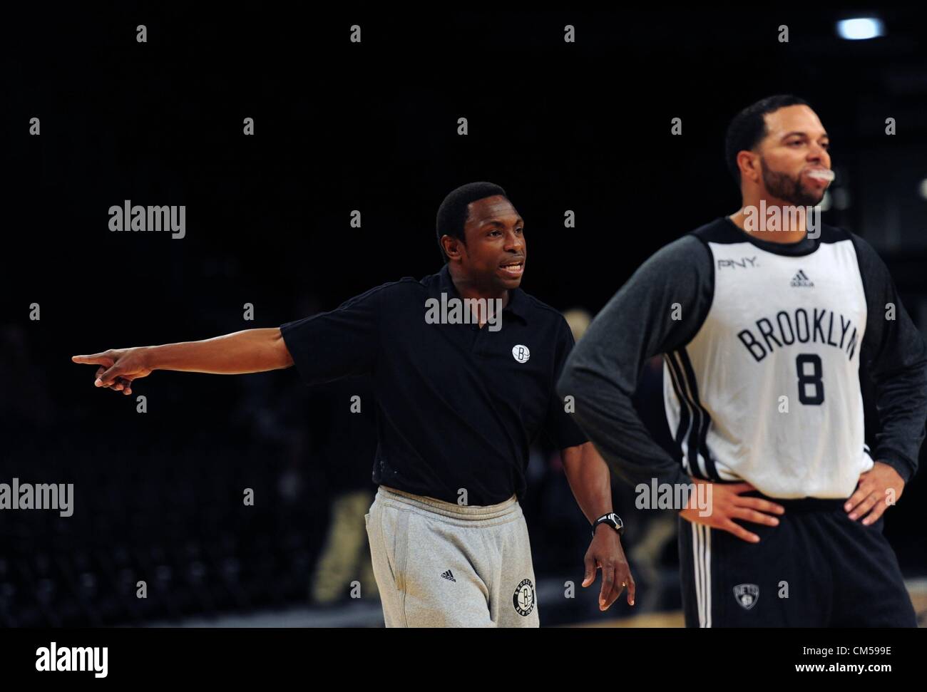 Oct. 7, 2012 - Brooklyn, New York, U.S. - Coach AVERY JOHNSON and DERON ...