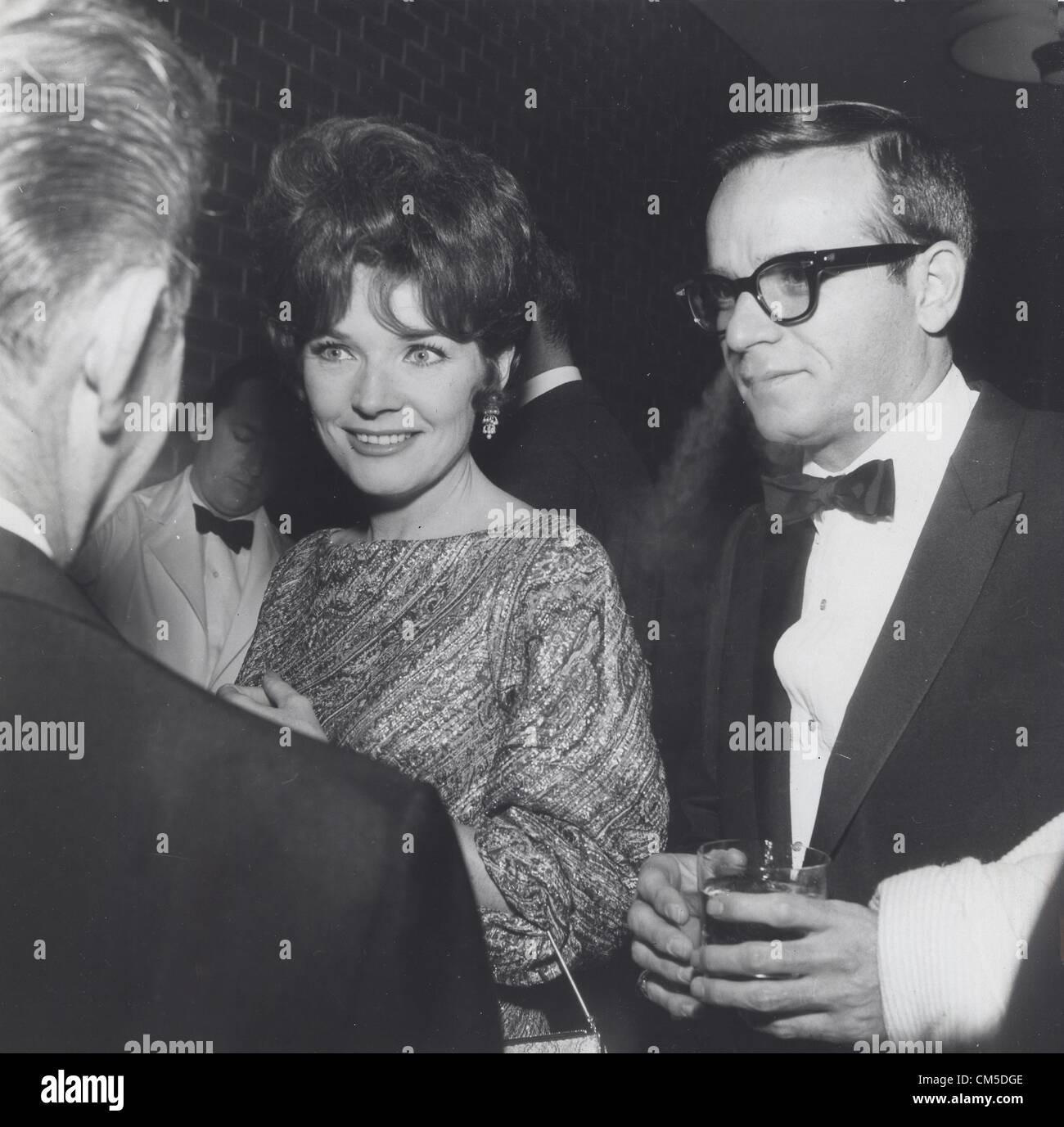 POLLY BERGEN with her husband Freddie Fields at Captain Newman premeire ...
