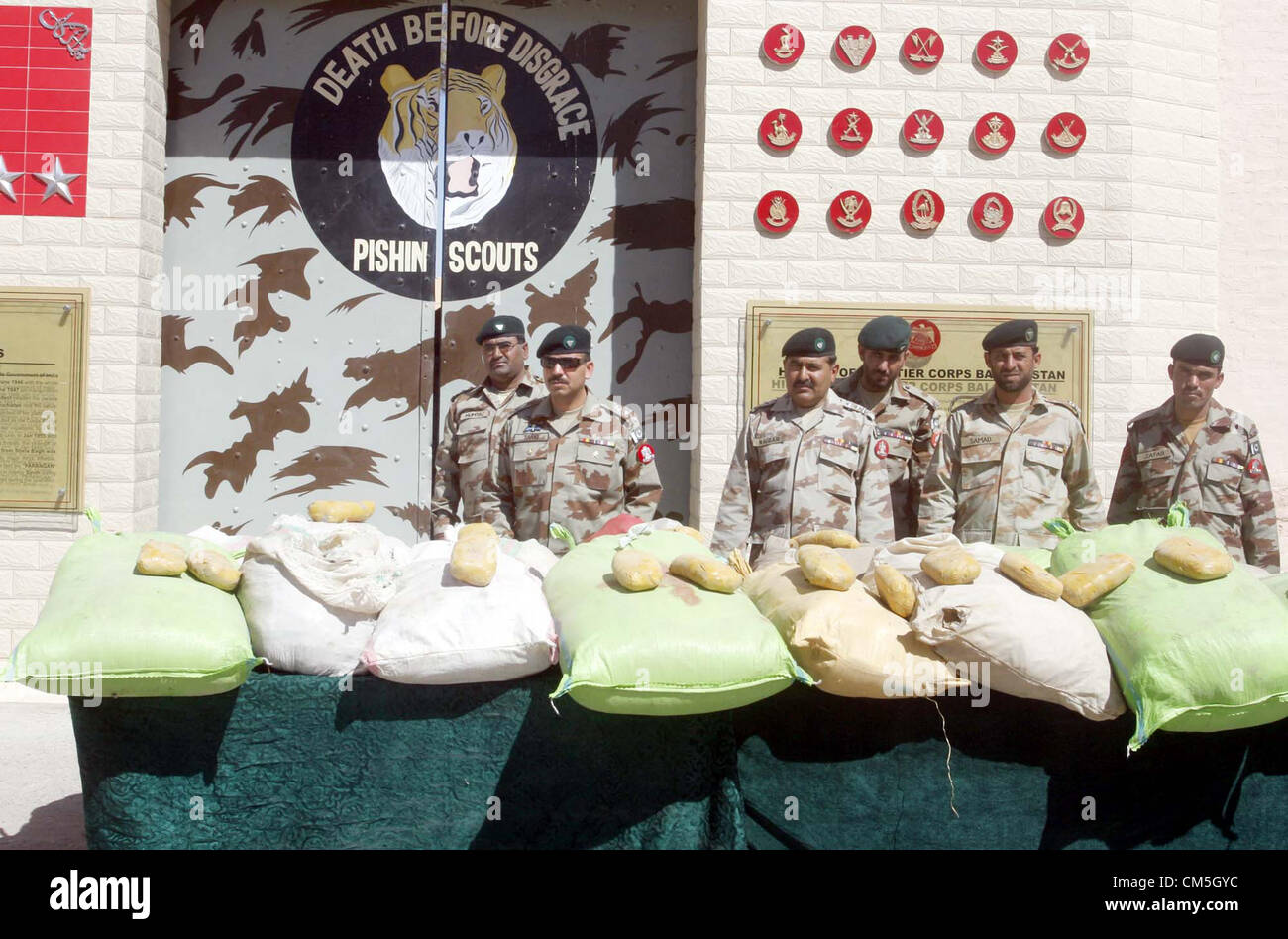 CHAMAN, PAKISTAN, OCT 09: Frontier Corps officials show seized packets ...