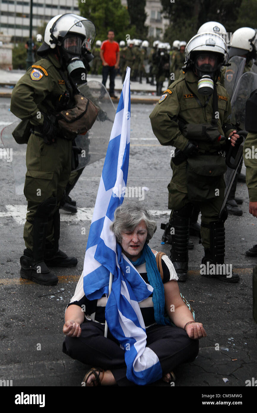 Athens, Greece. Tuesday 09 October 2012 Pictured: A female protester ...