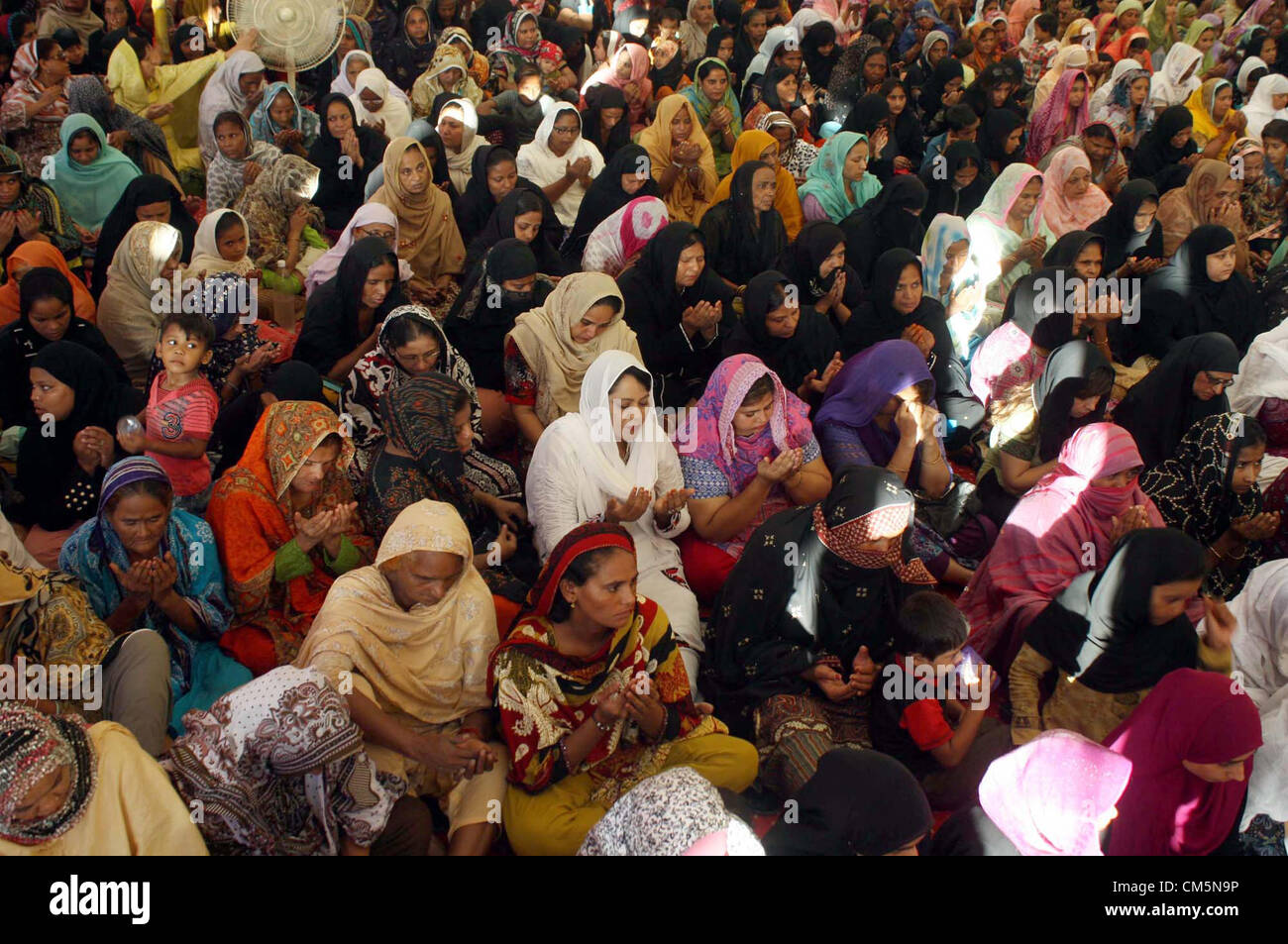 Women prayer for Malala Yousaf Zai during a pray ceremony held at ...