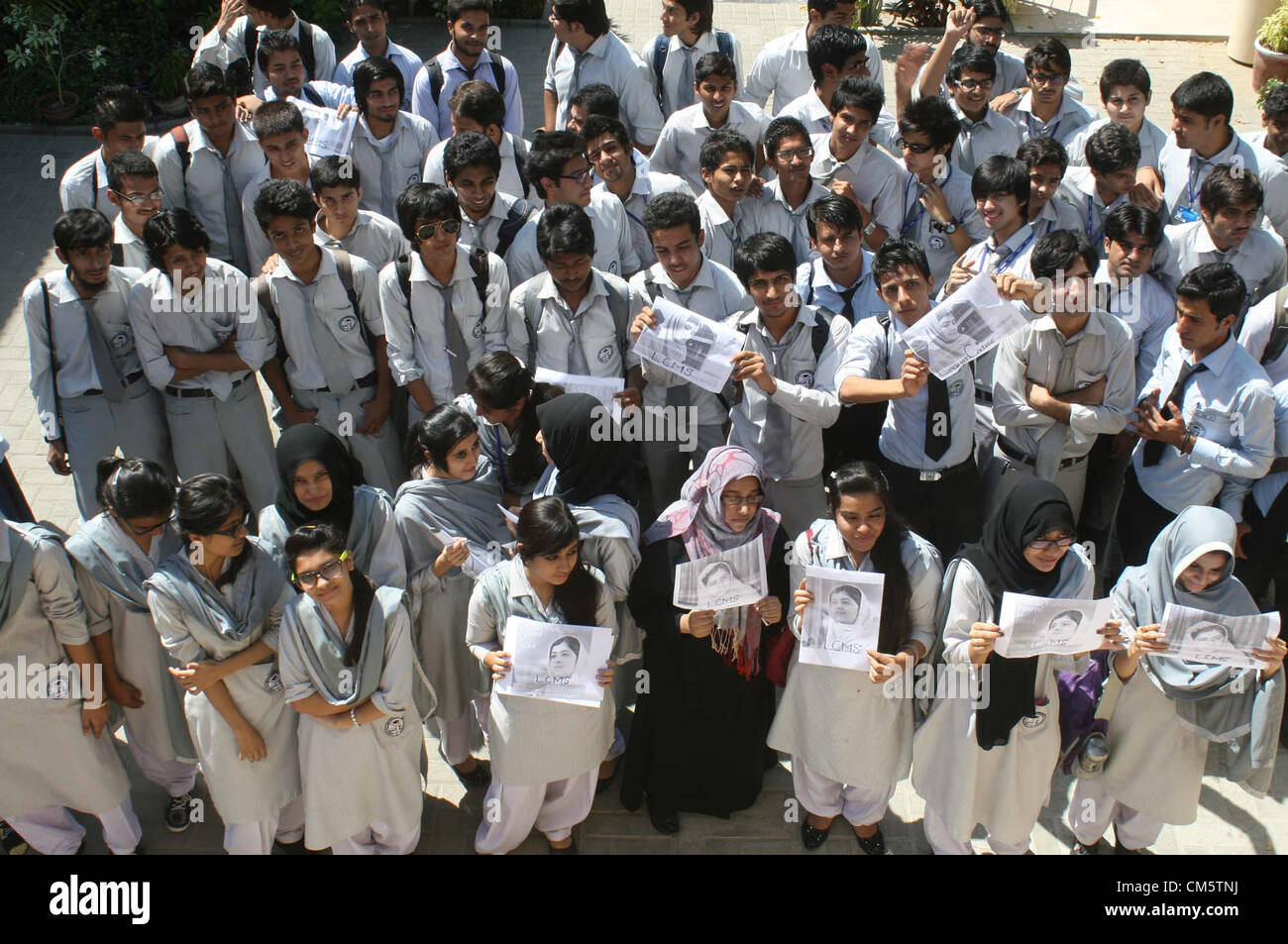 Students prayer for Malala Yousaf Zai during college assembly at ...