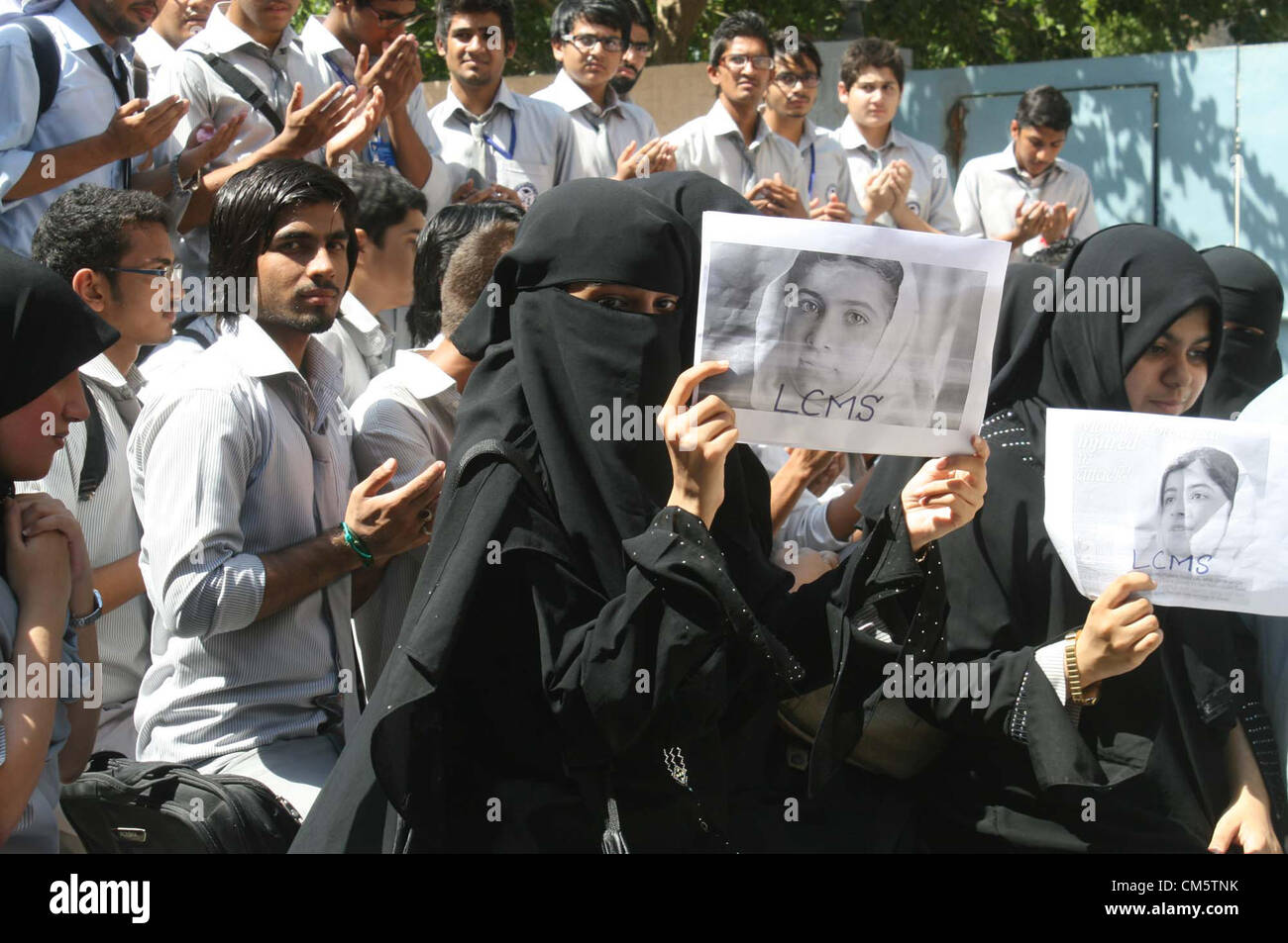 Students prayer for Malala Yousaf Zai during college assembly at ...