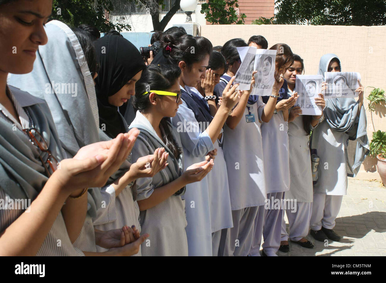 Students prayer for Malala Yousaf Zai during college assembly at ...