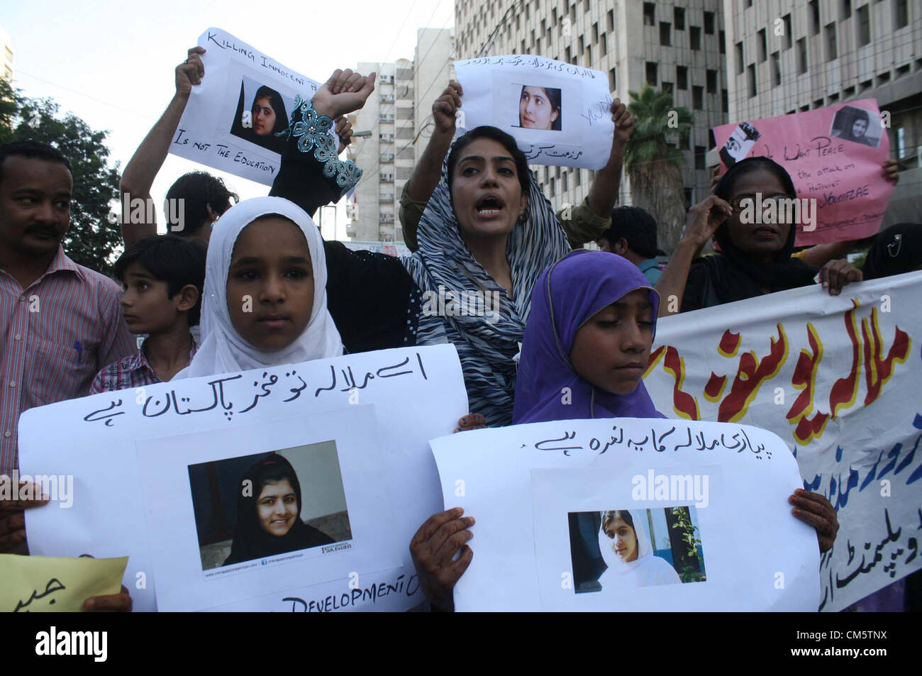Activists of Youth and Women Development Organization chant slogans ...