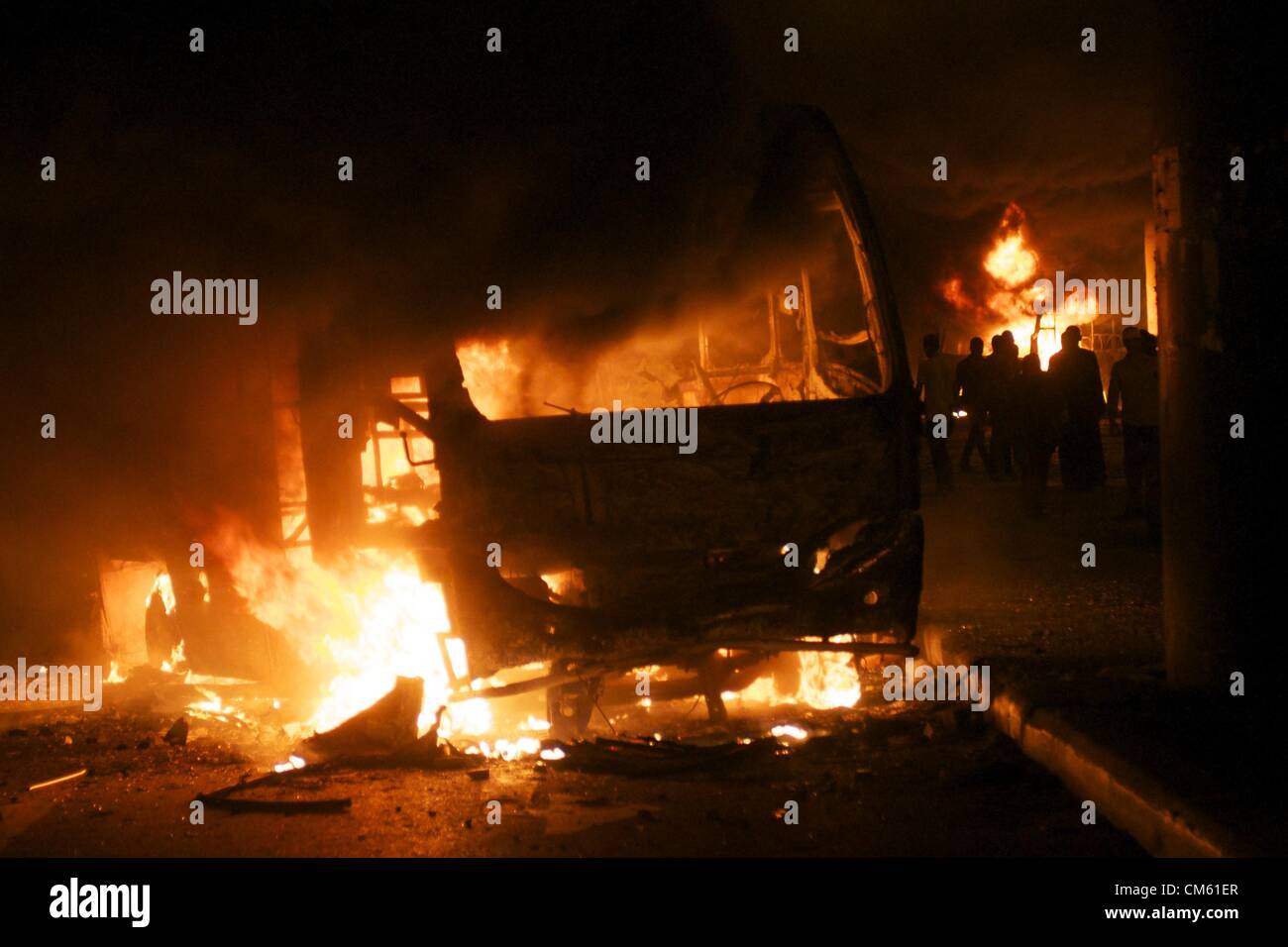 Oct. 12, 2012 - Cairo, Egypt - Two buses burn near Tahrir Square after ...