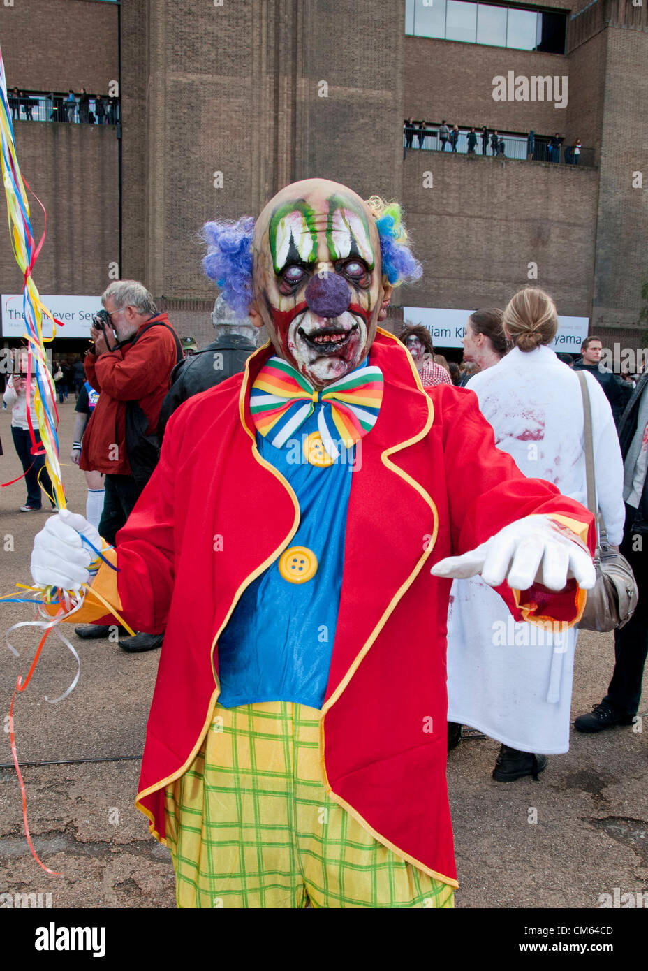 London, UK. 13/10/12. The zombie horde rampages around the Tate Modern ...