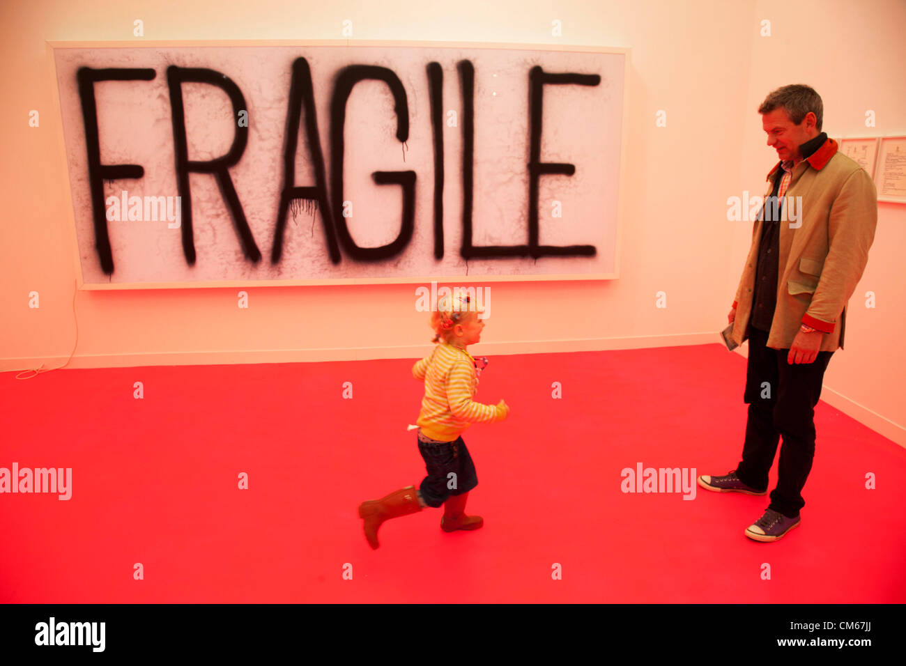 Fragile artwork by Rirkrit Tiravanija. Visitors and exhibitors at the ...
