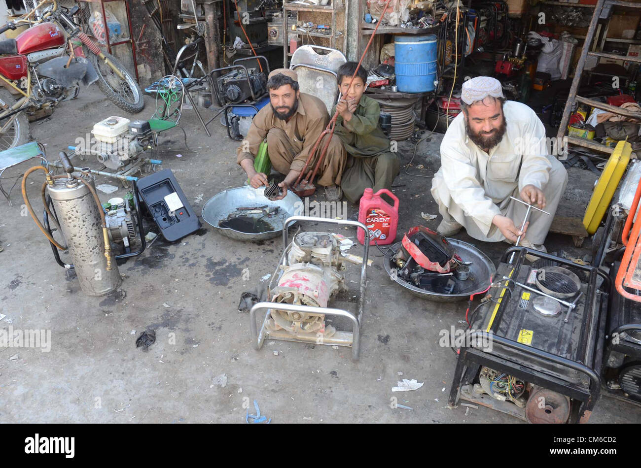 Electric generator mechanics are busy in maintenance service of ...