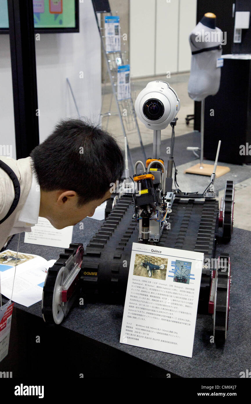 October 17, 2012, Tokyo, Japan - Visitor sees a prototype robot with ...