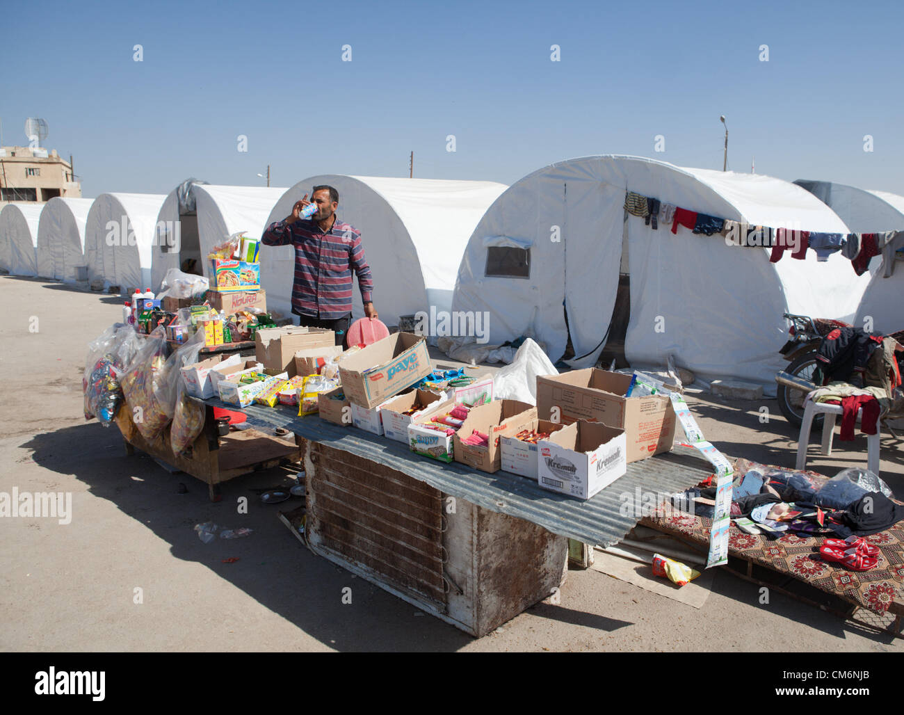 Azaz, Syria. 17th October 2012. A man works at a market at the Syrian ...