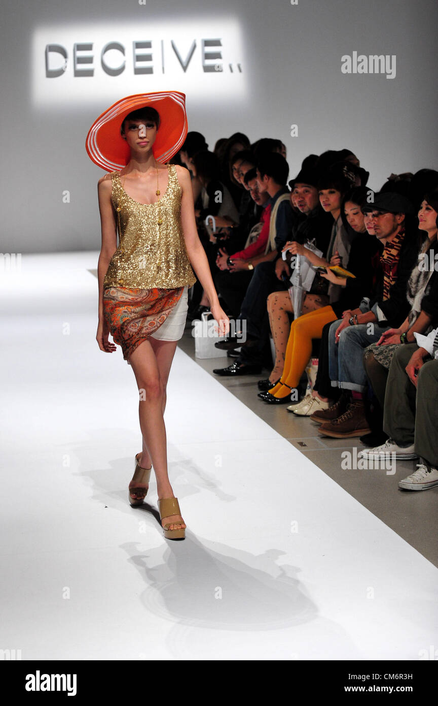 October 18, 2012, Tokyo, Japan - A model poses on the catwalk wearing ...