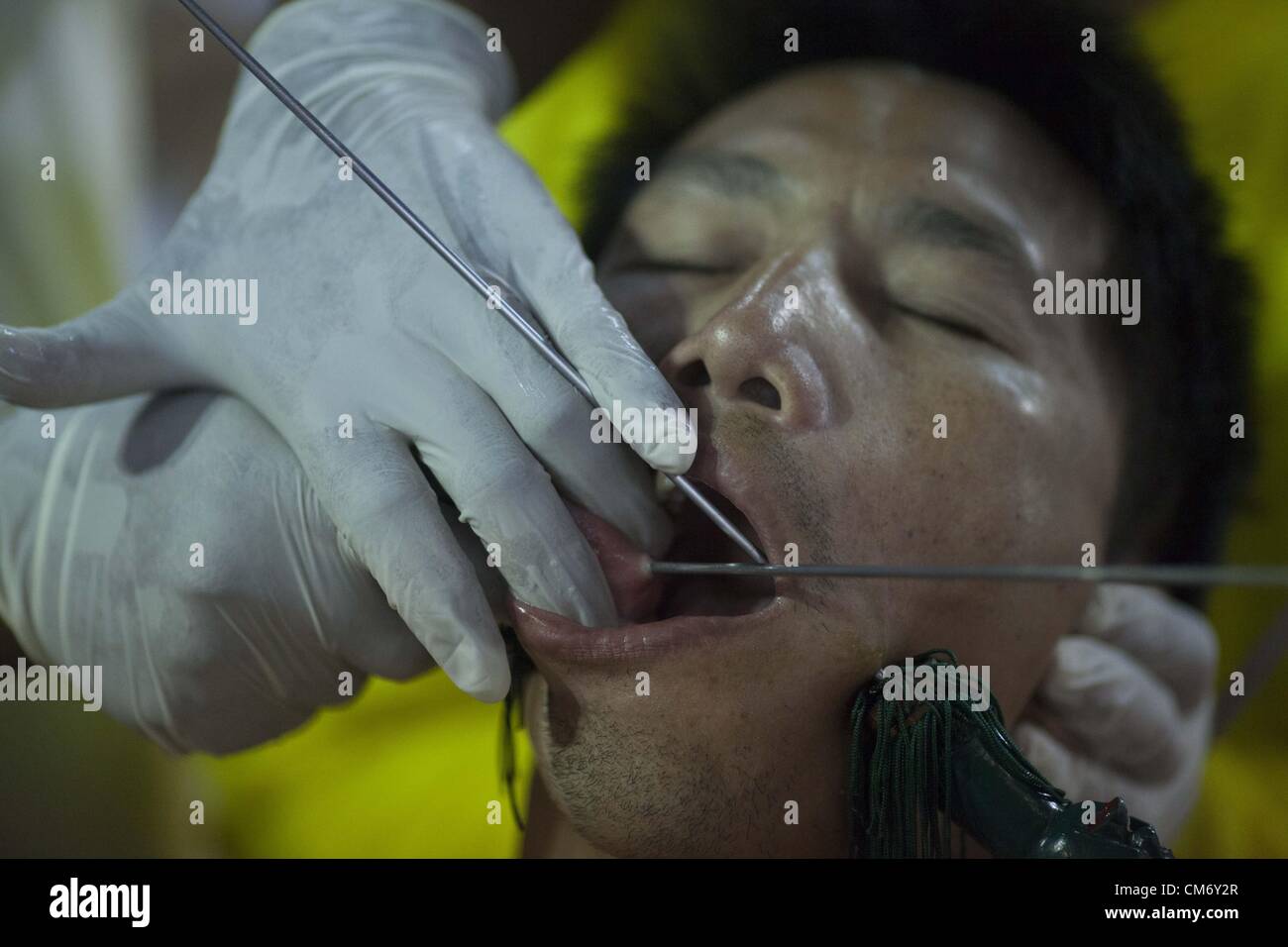Oct. 19, 2012 - Phuket, Thailand - Devotees to the Chinese shrine of ...