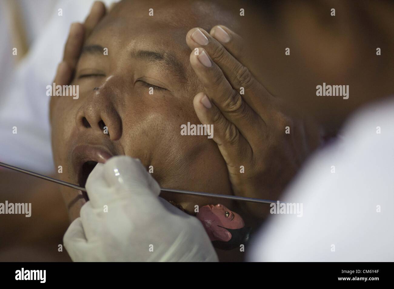 Oct. 19, 2012 - Phuket, Thailand - Devotees to the Chinese shrine of ...