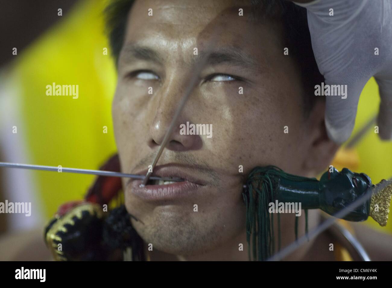 Oct. 19, 2012 - Phuket, Thailand - Devotees to the Chinese shrine of ...