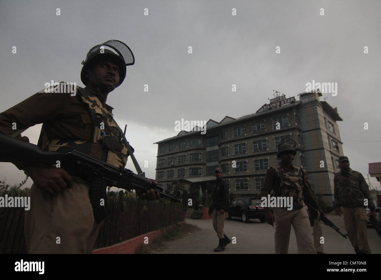 Srinagar, India. Oct. 19, 2012. Security personnel stand guard outside ...