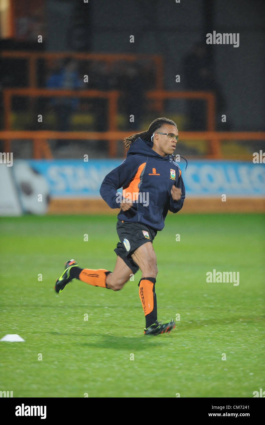Barnet, England. 19th October 2012. Edgar Davids warms up before the ...