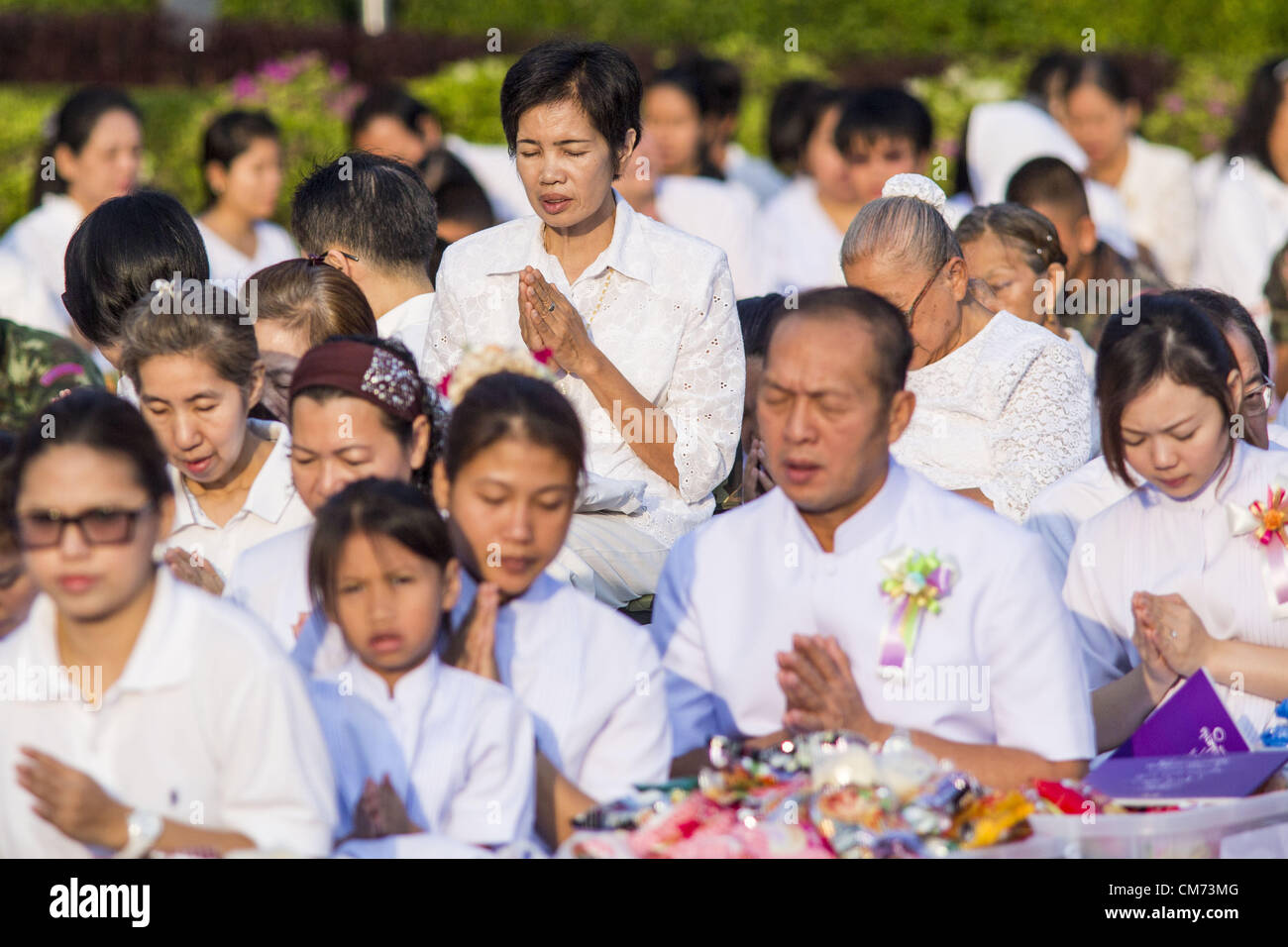Oct. 20, 2012 - Bangkok, Thailand - Members of the public pray for ...
