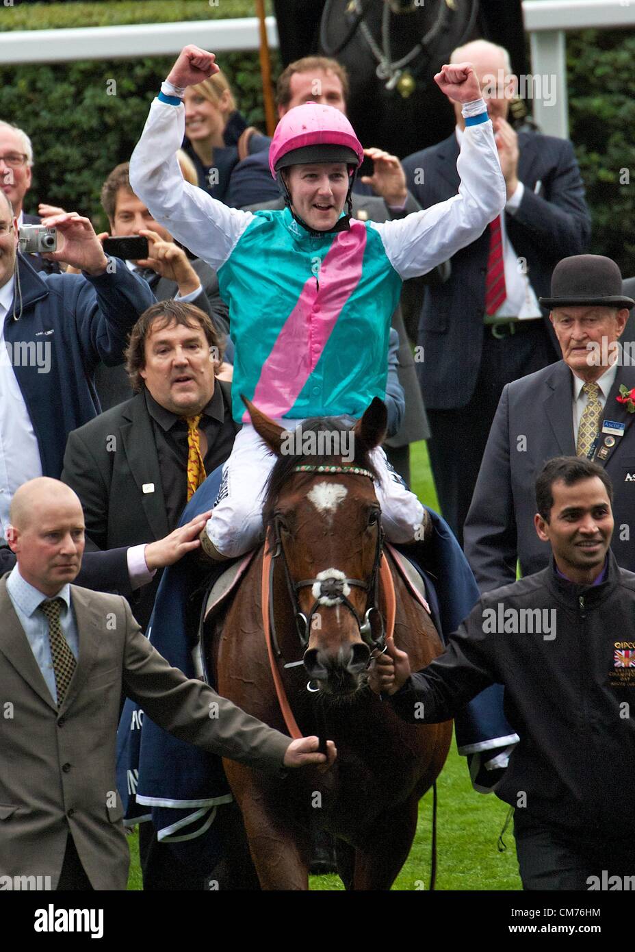 Ascot, UK. 20th October 2012. Jockey Tom Queally returns to the winners ...